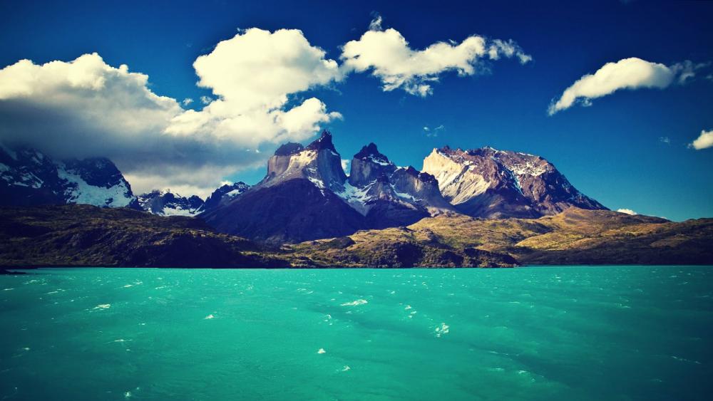 Majestic Mountains Under Cloudy Skies - backiee