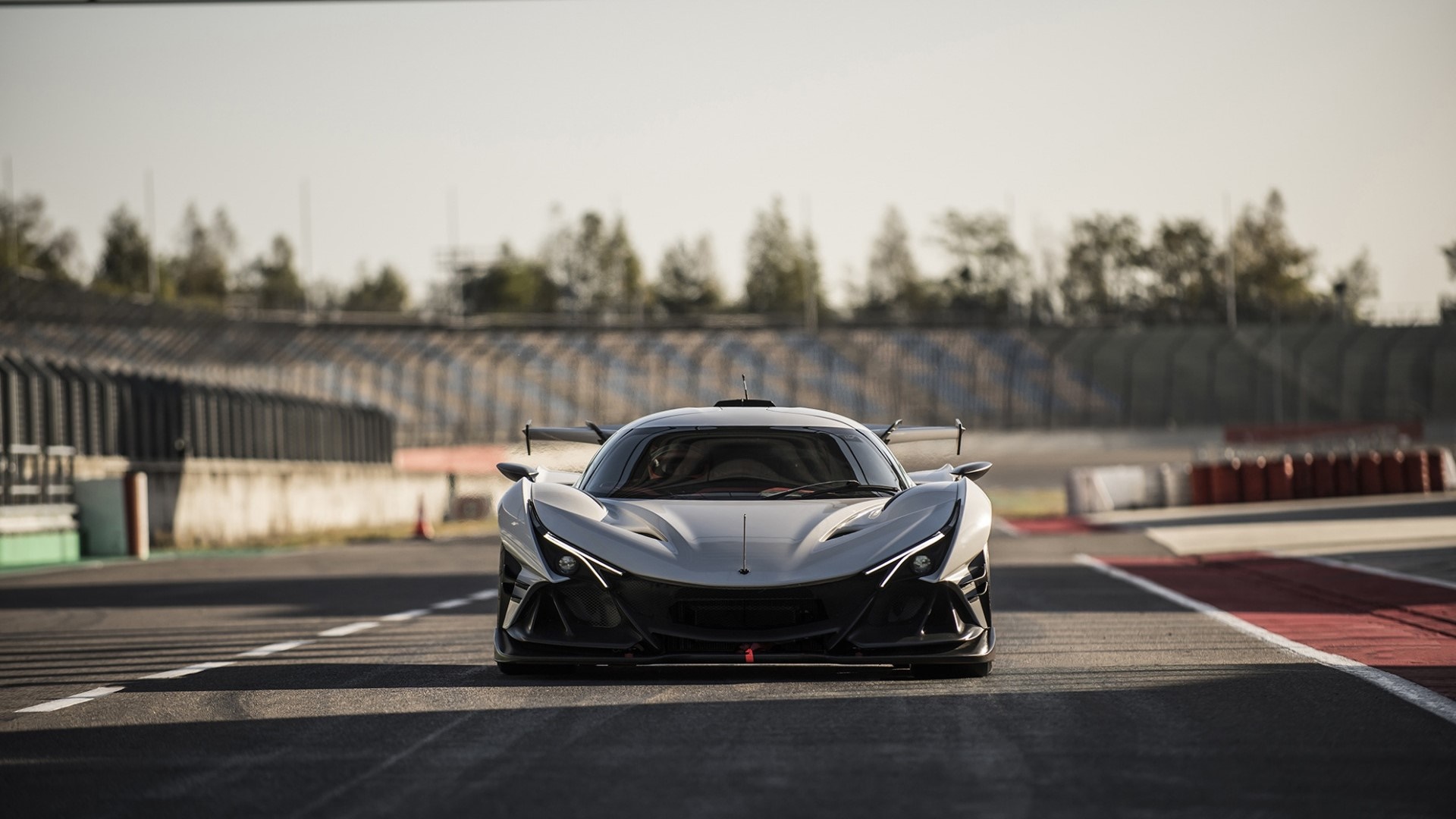 Apollo Evo Hypercar on the Racetrack - backiee