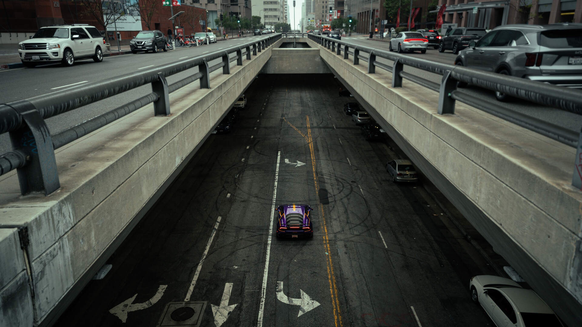 Urban Underpass Drive Purple Supercar on Dark Asphalt Road - backiee