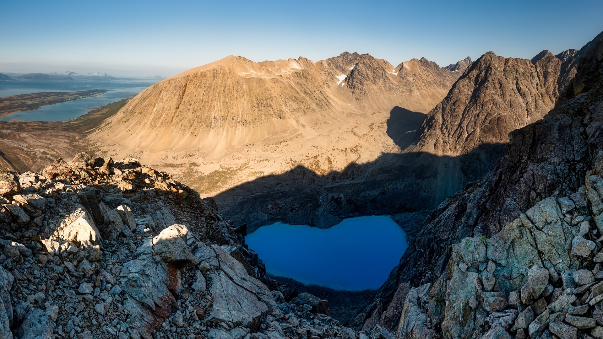 Evening Mountain Vista Above a Turquoise Heart Shaped Lake - backiee