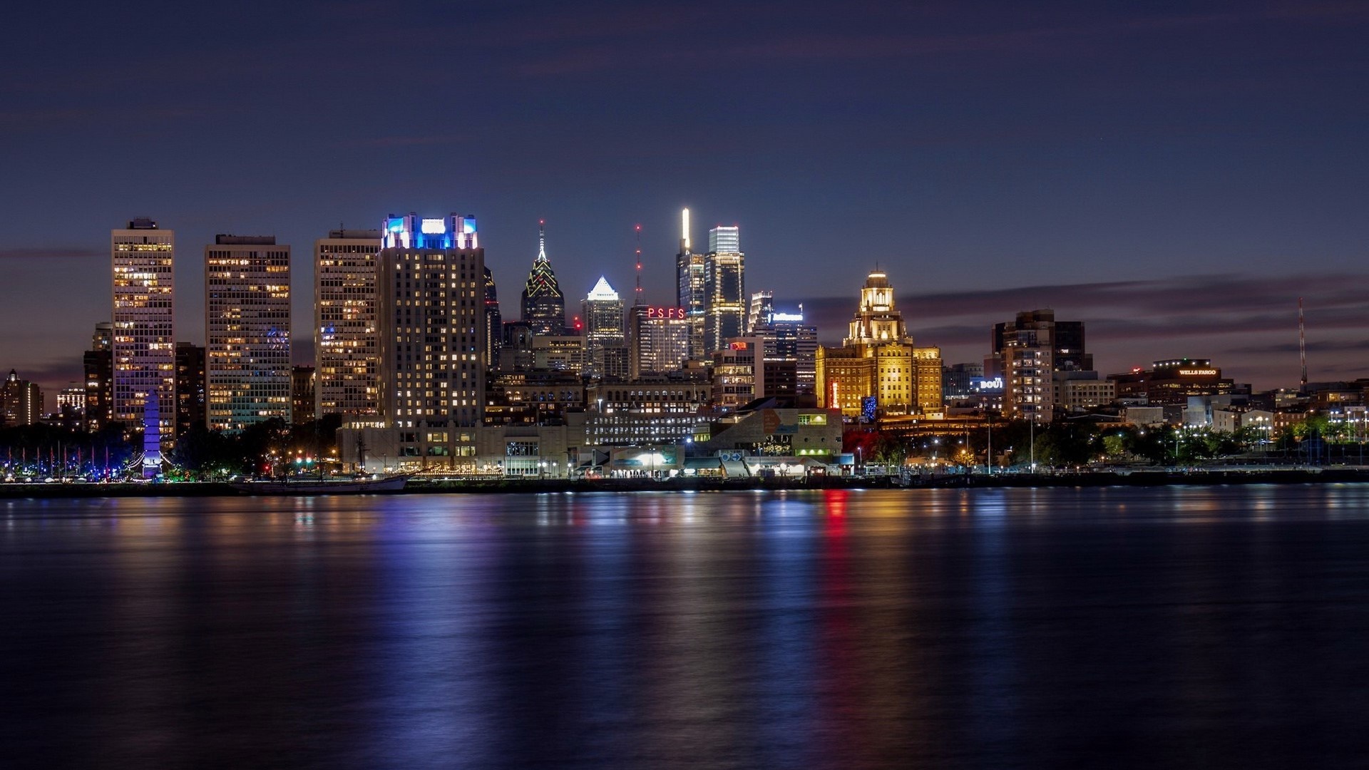 Philadelphia Skyline Reflections Over the Delaware River at Dusk - backiee