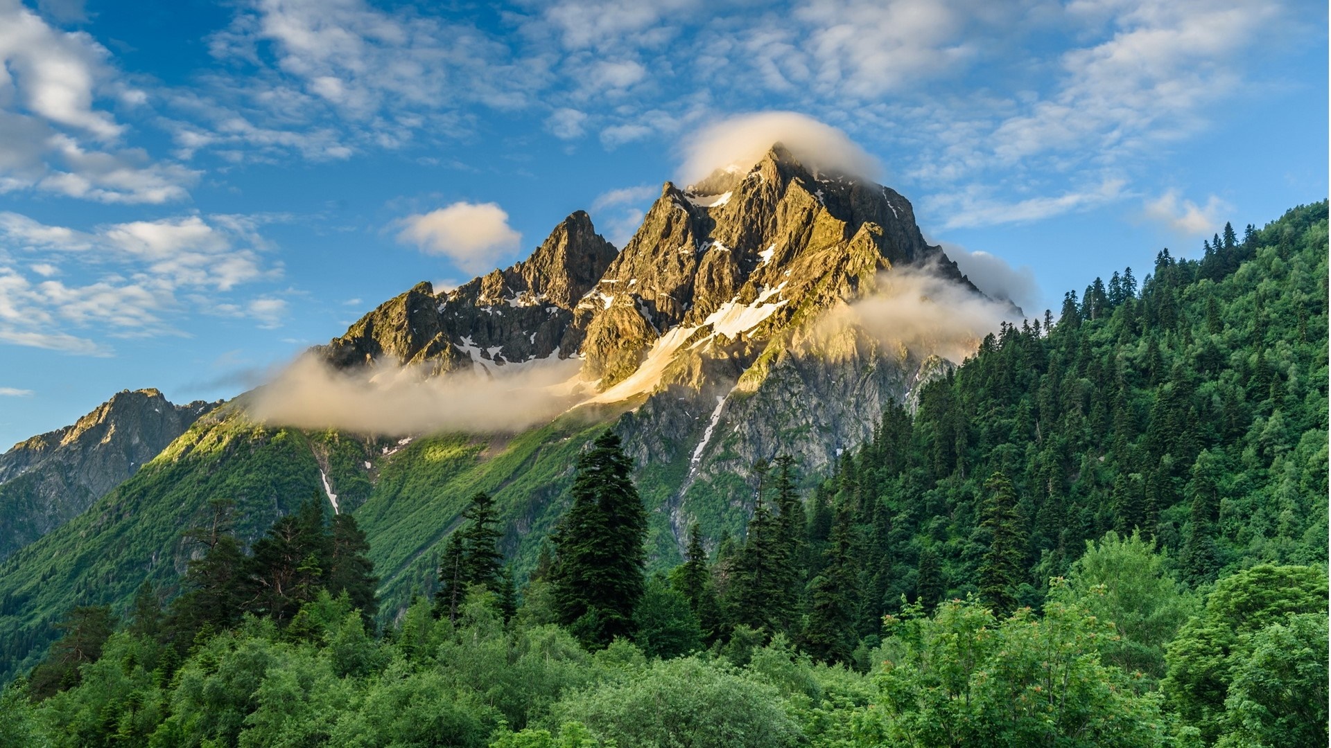 Golden Morning Clouds Over the Rugged Caucasus Mountains - backiee