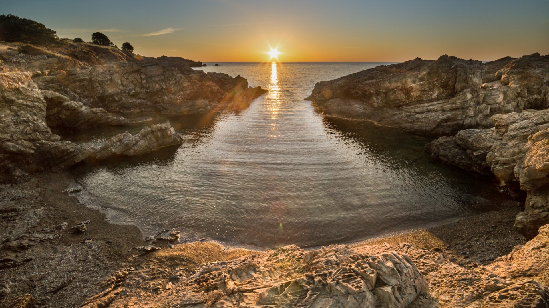 Sunset Calm Over Cala Bramant Bay on the Costa Brava - backiee