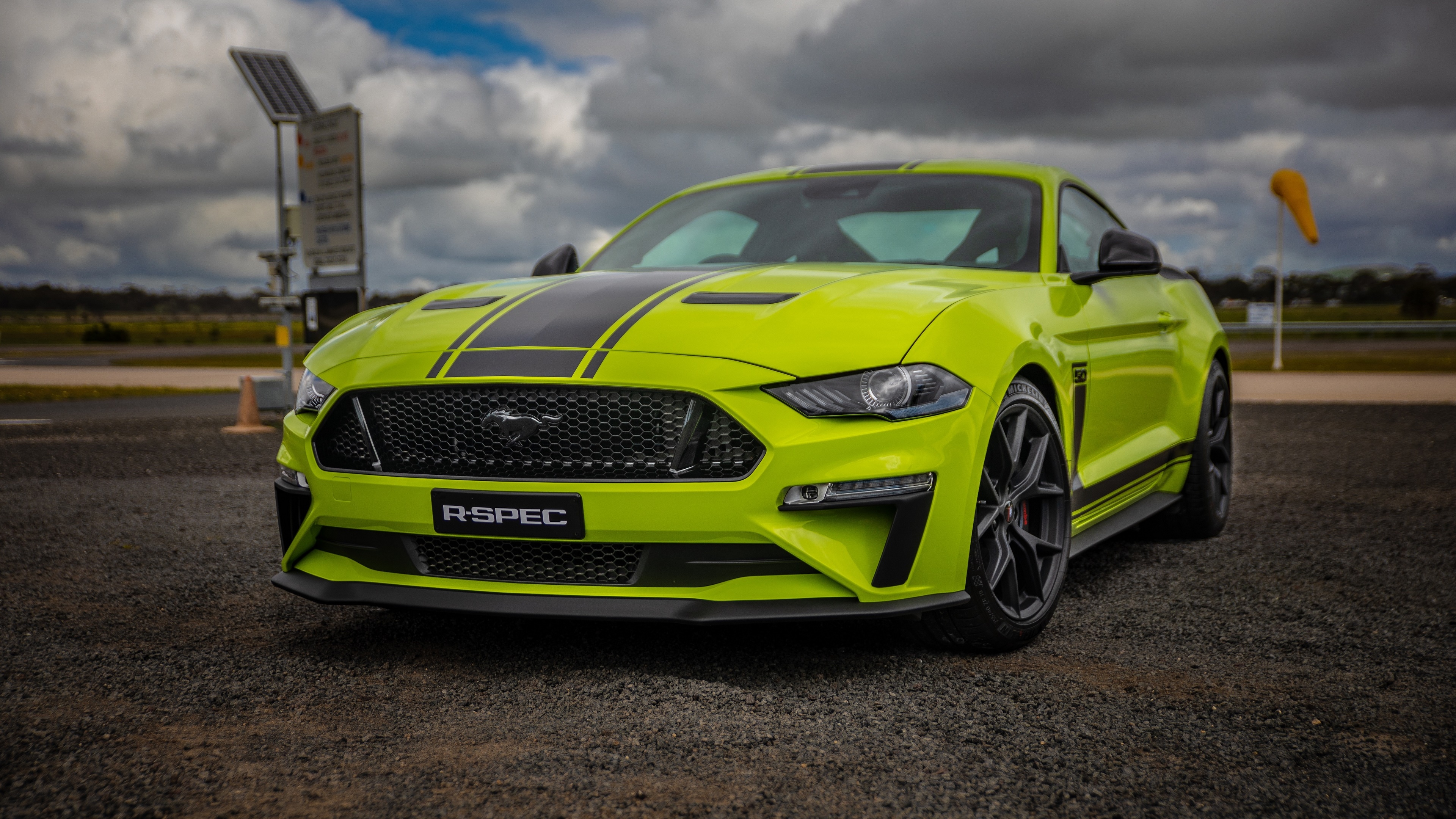 Vibrant Green Mustang on Overcast Day - backiee
