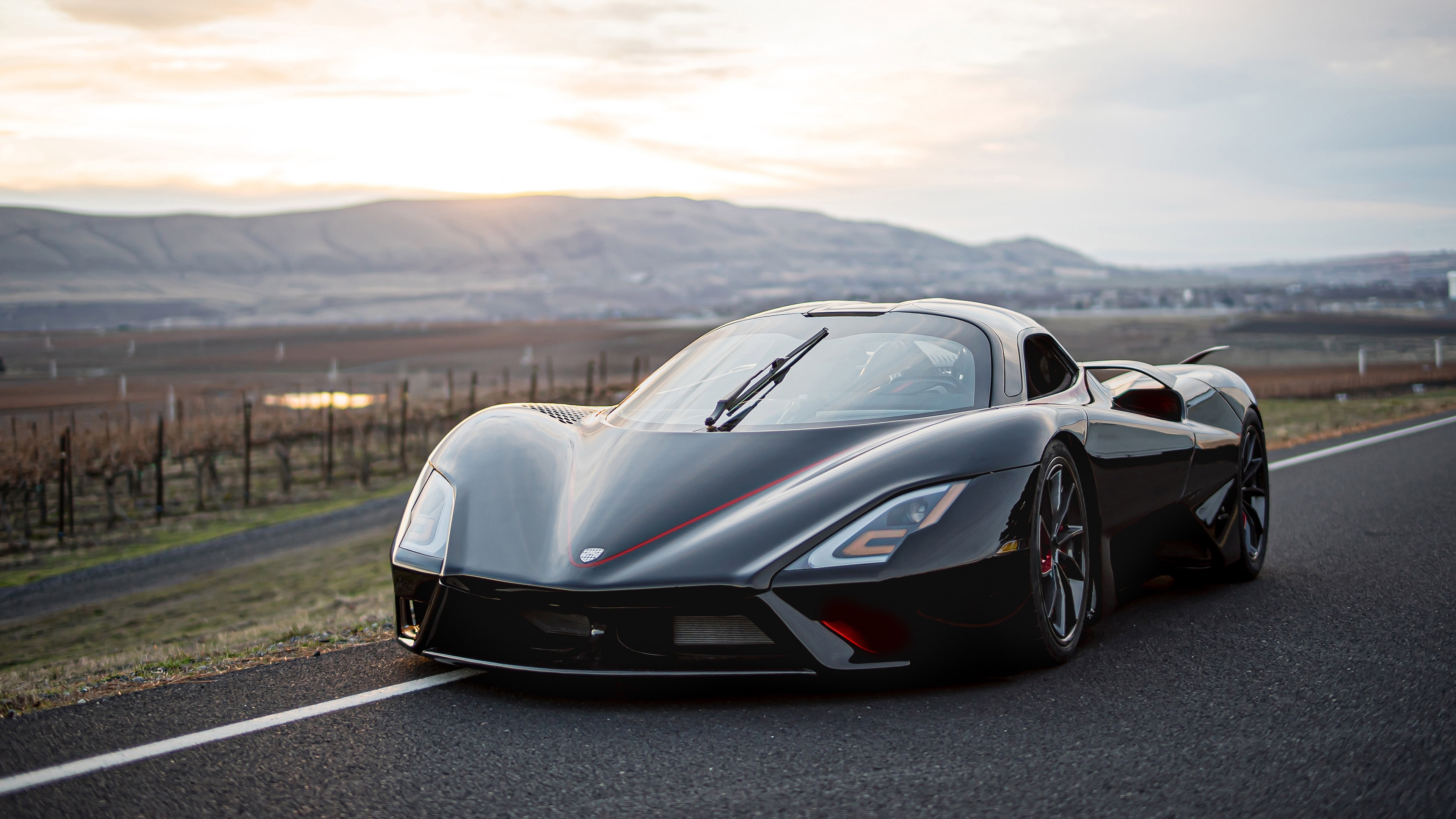 SSC Tuatara Hypercar Poised for a Sunset Road Sprint in 4K - backiee
