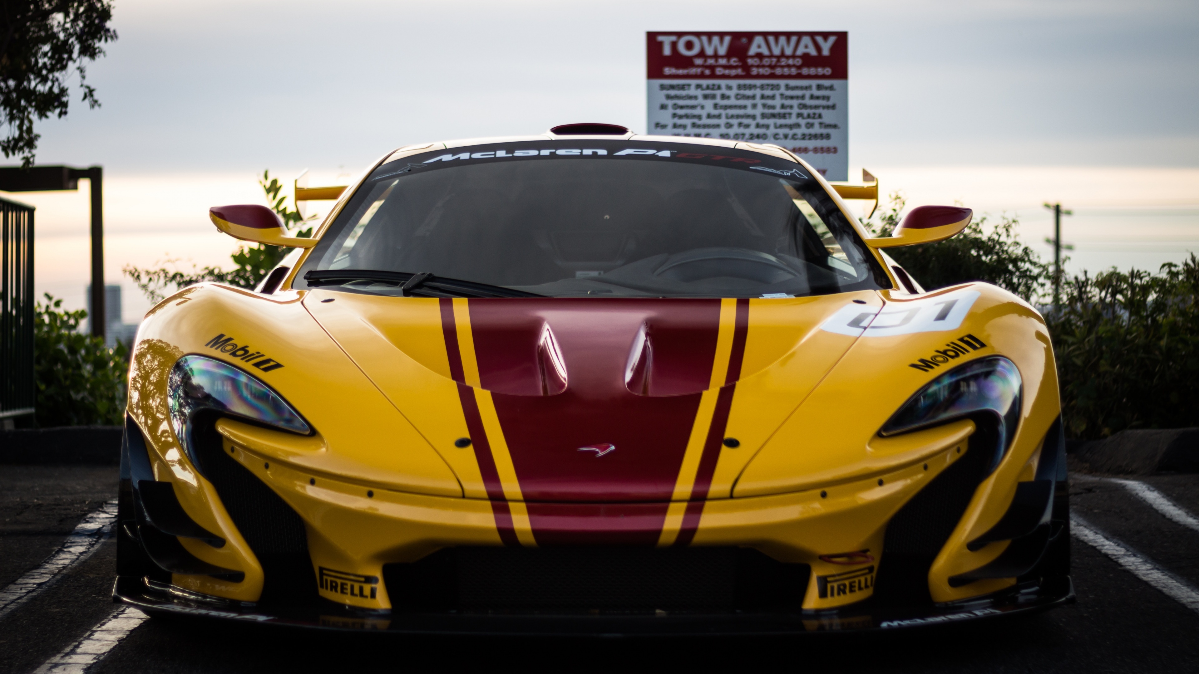McLaren P1 Front View in Bold Yellow and Red Racing Livery - backiee
