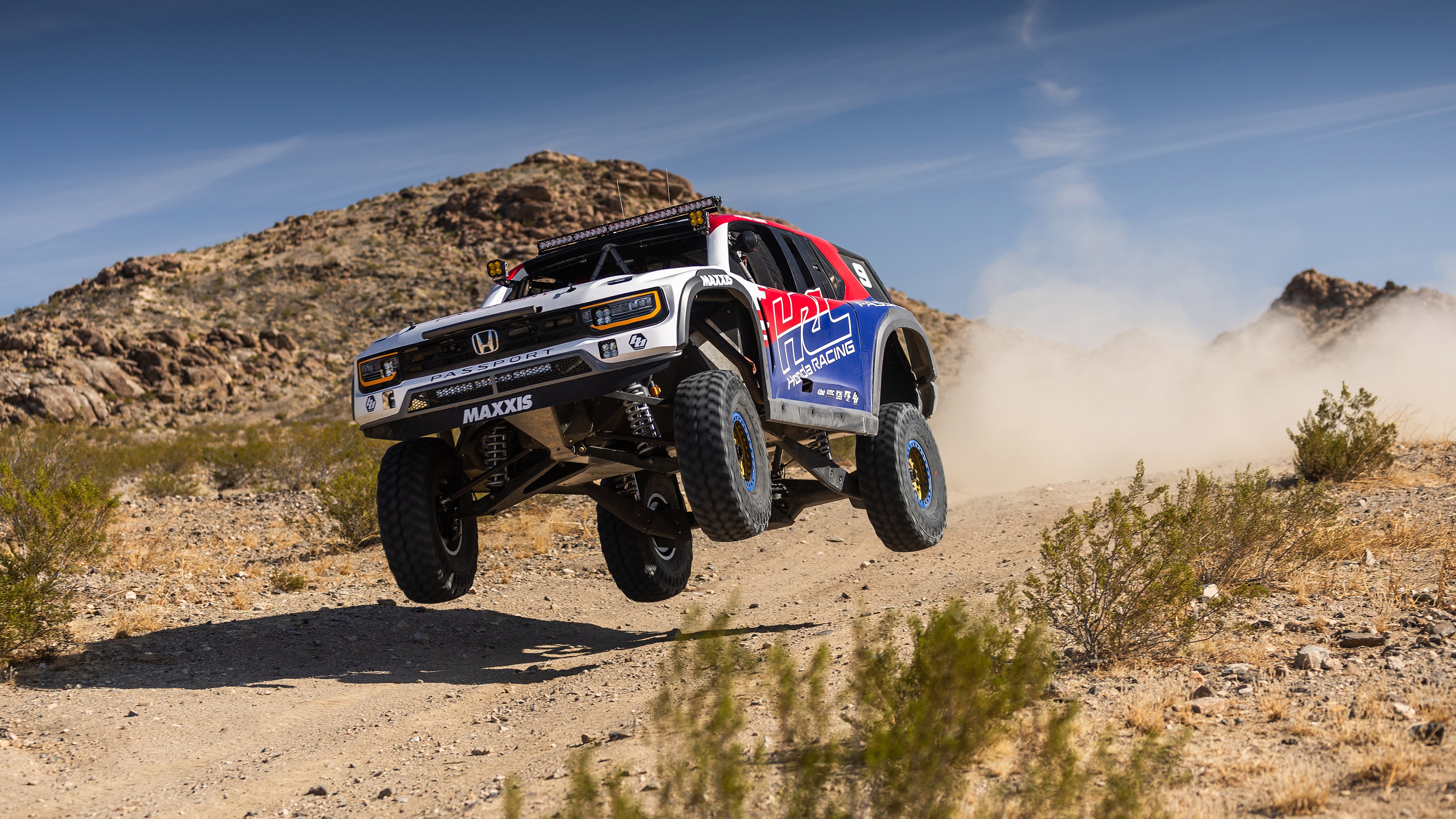 Honda Off Road Racer Flying Through Baja Desert Dust in 4K - backiee