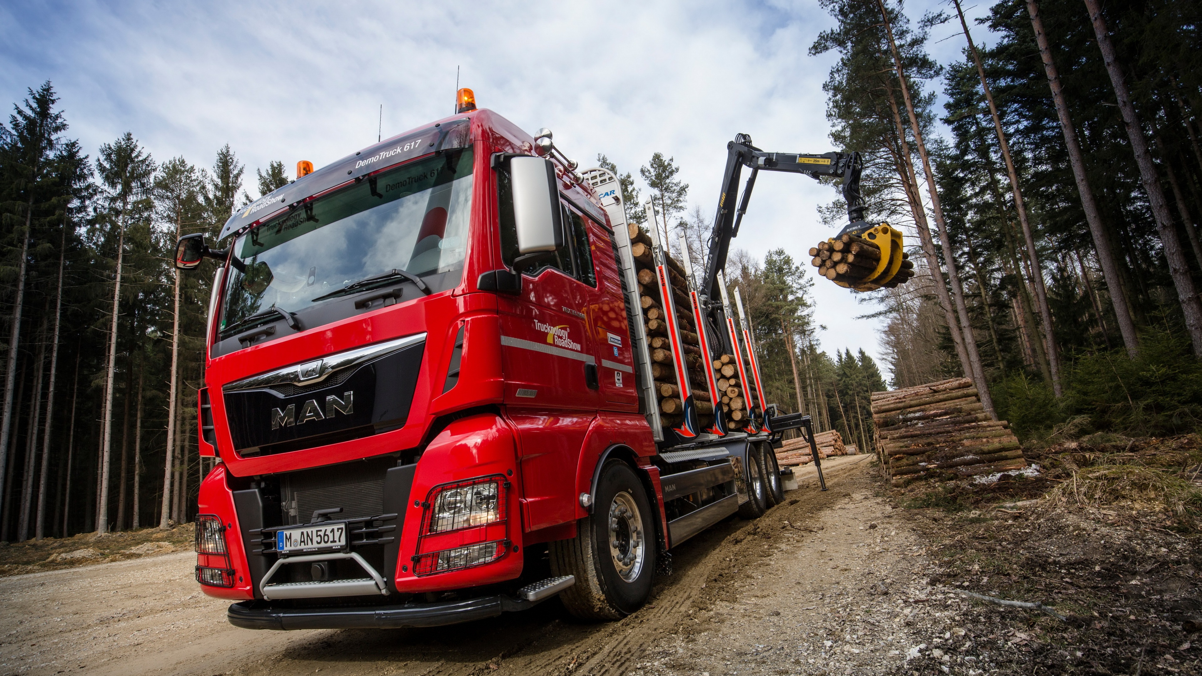 Powerful MAN Logging Truck in Forest Road 4K Wallpaper - backiee
