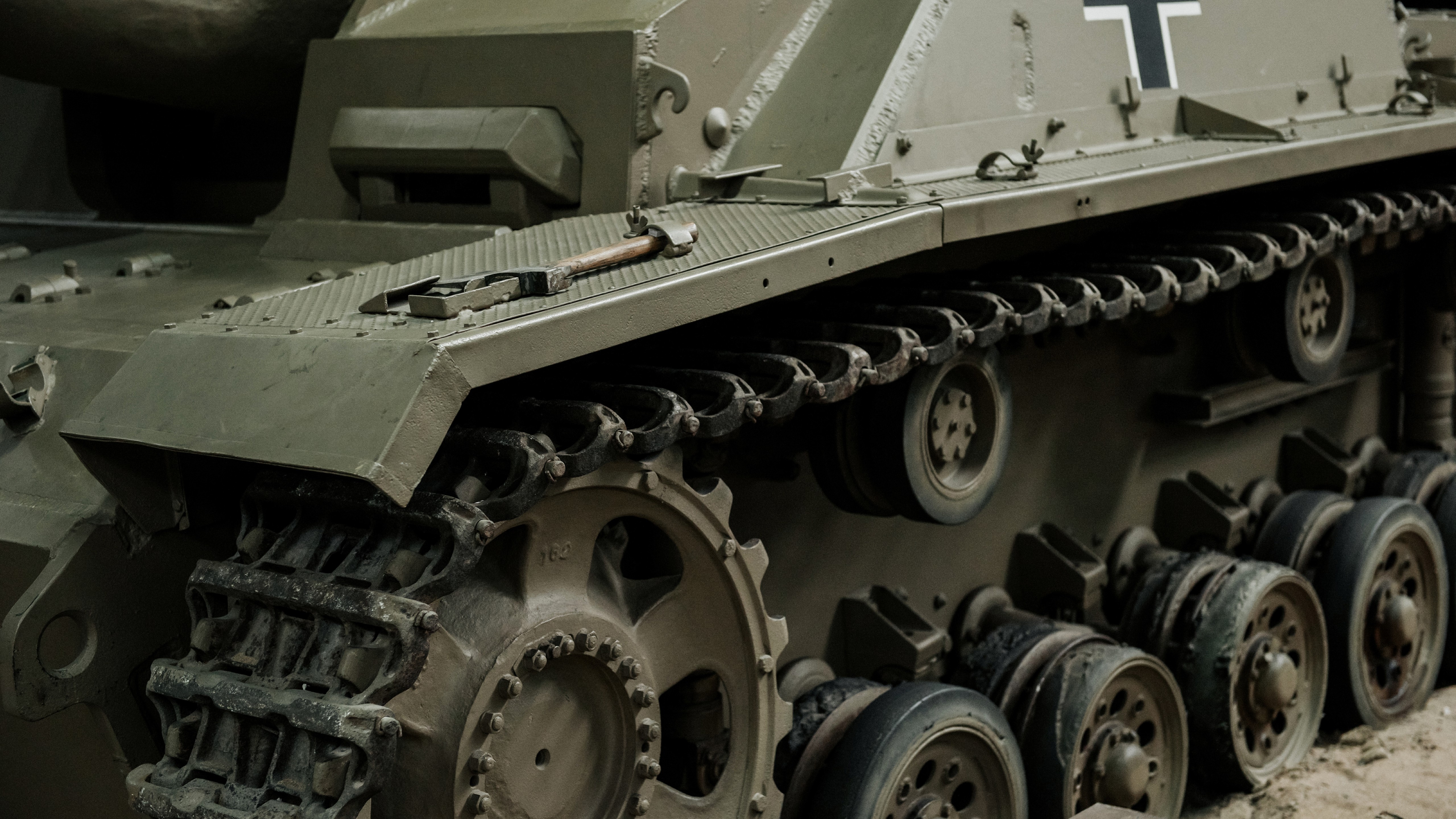 Armored Tank Treads Close Up in High Detail 5K Wallpaper - backiee