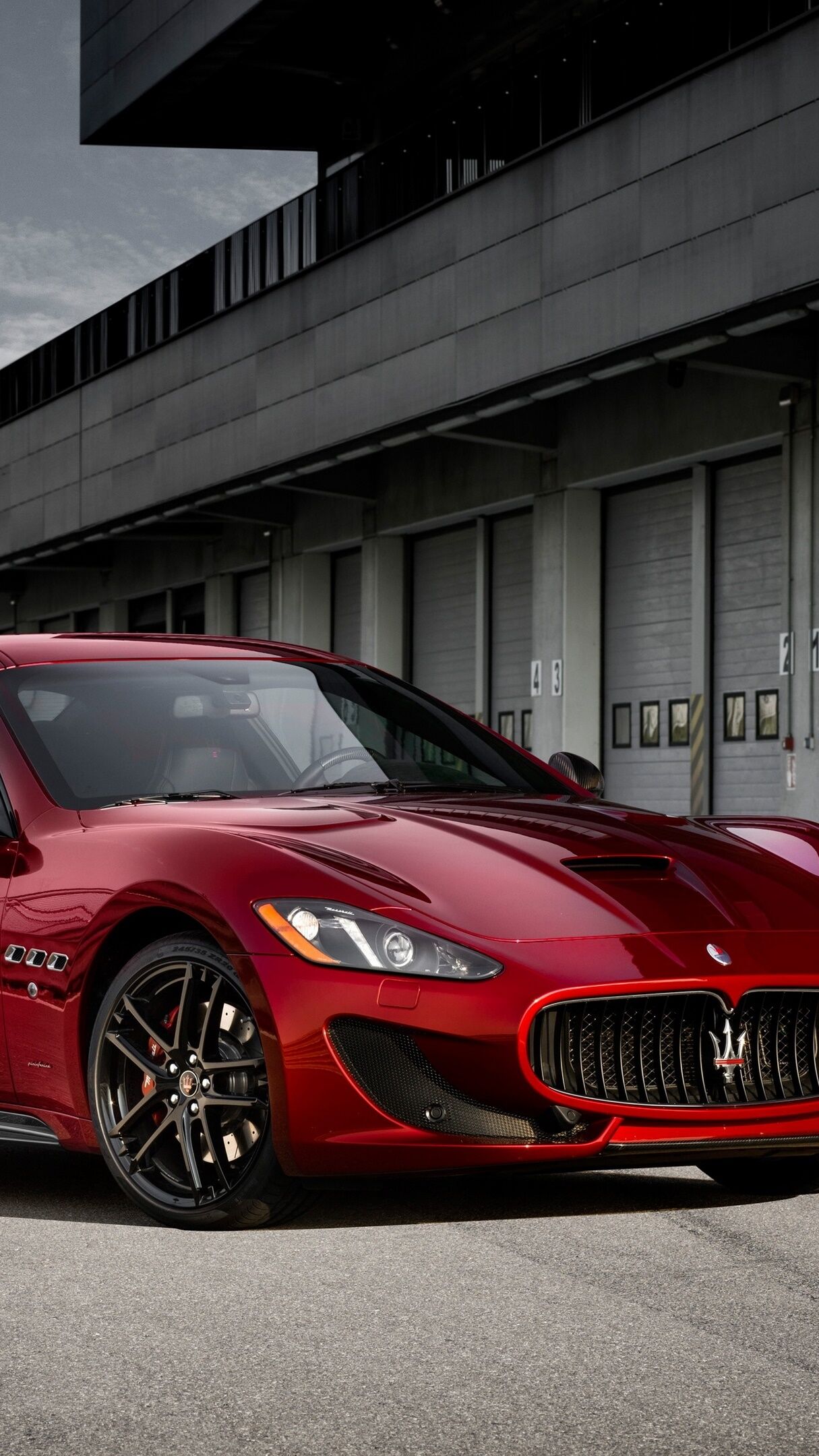 Crimson Maserati GranTurismo Parked at the Track in 4K - backiee