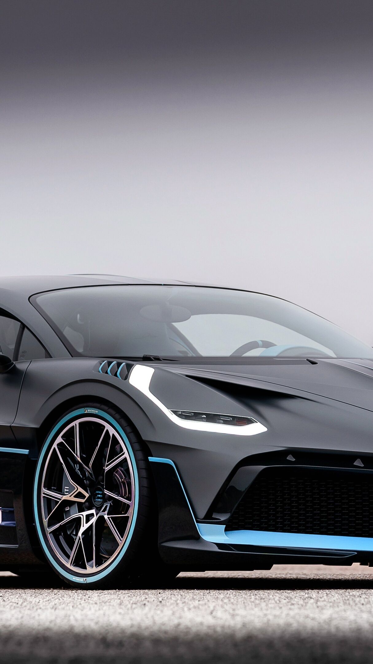 Bugatti Divo Supercar in 4K Matte Black and Blue Elegance - backiee