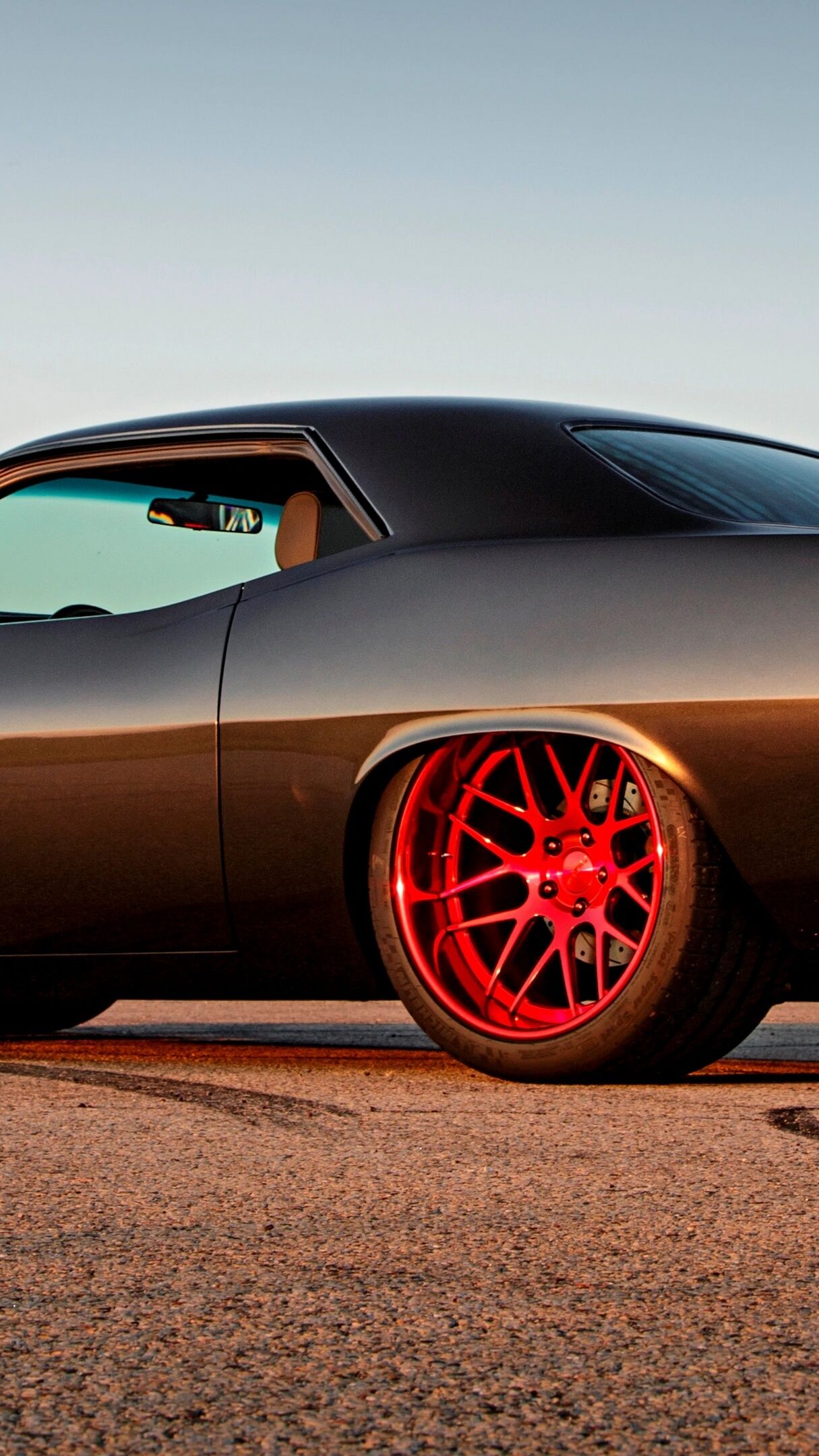 Satin Black Plymouth Hemi Cuda Muscle Car at Sunset 4K - backiee