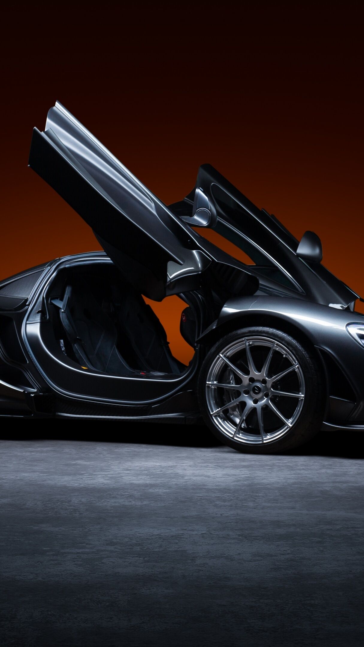 McLaren P1 Hypercar With Doors Up In Dramatic Studio Glow - backiee