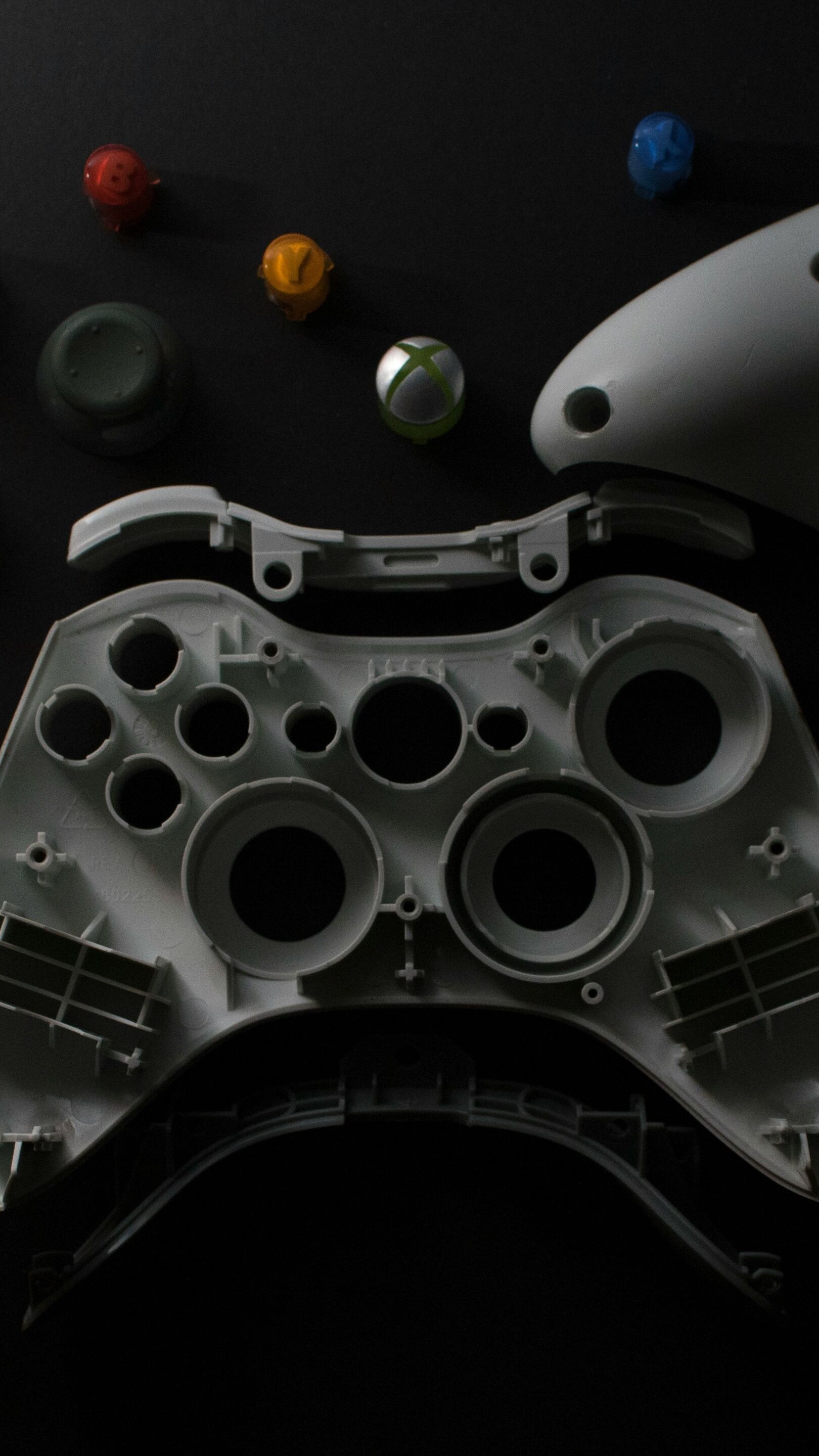 Xbox Controller Disassembled on Black Background - backiee