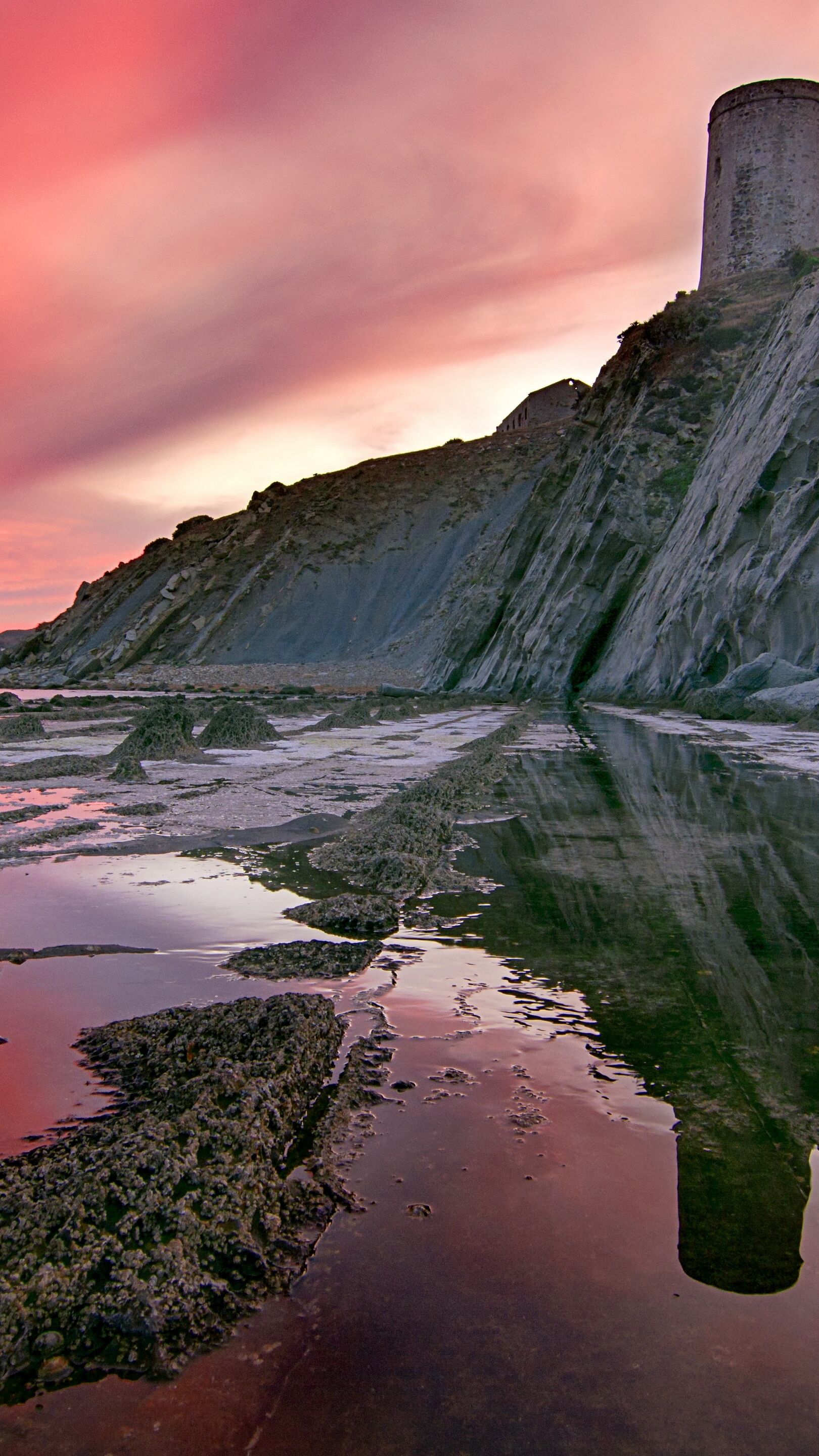 Sunset Reflections at Torre Del Guadalmesi Coastline in Cádiz Spain ...