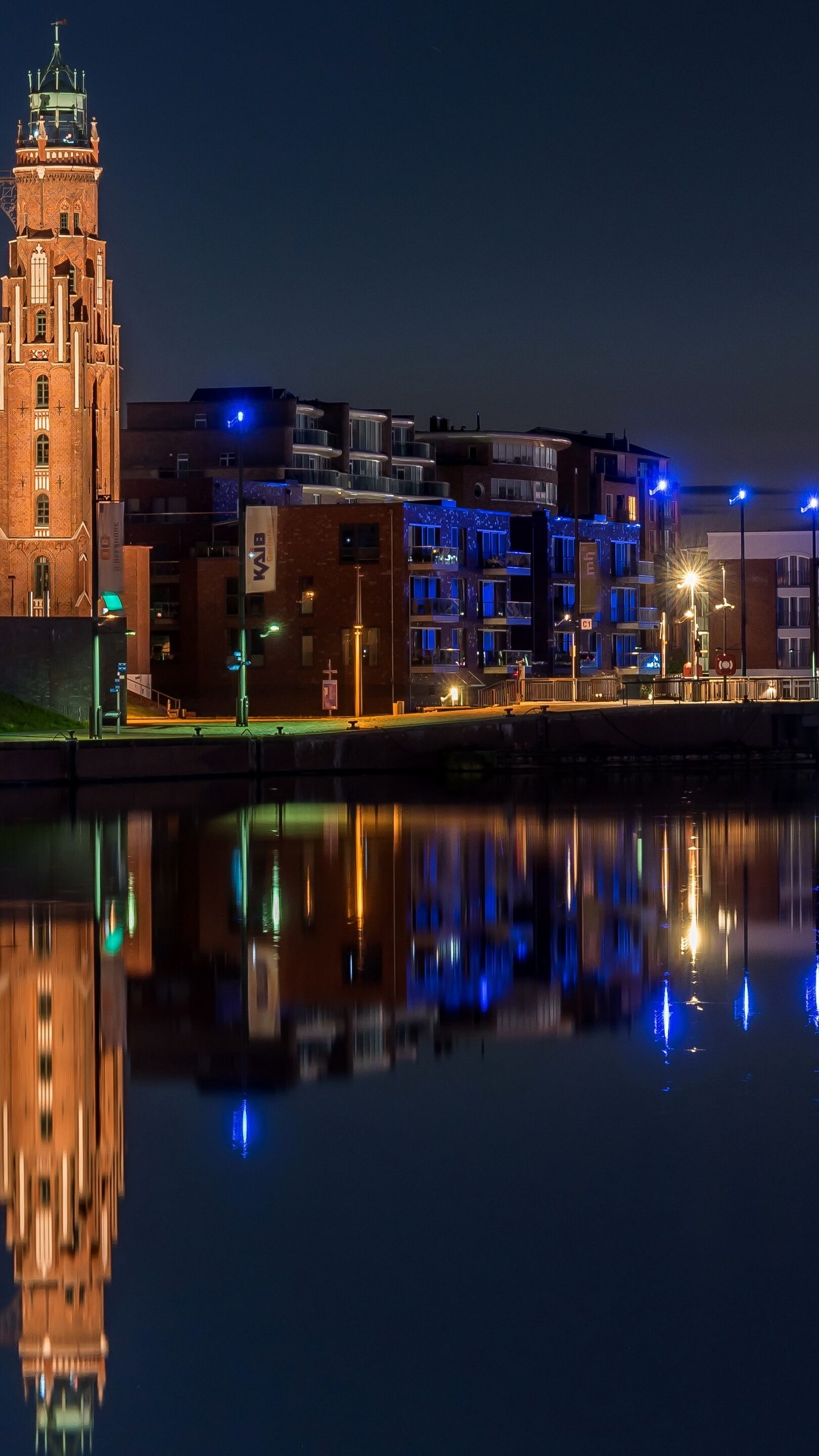 Simon Loschen Tower Reflections Over Bremerhaven Harbor at Night - backiee