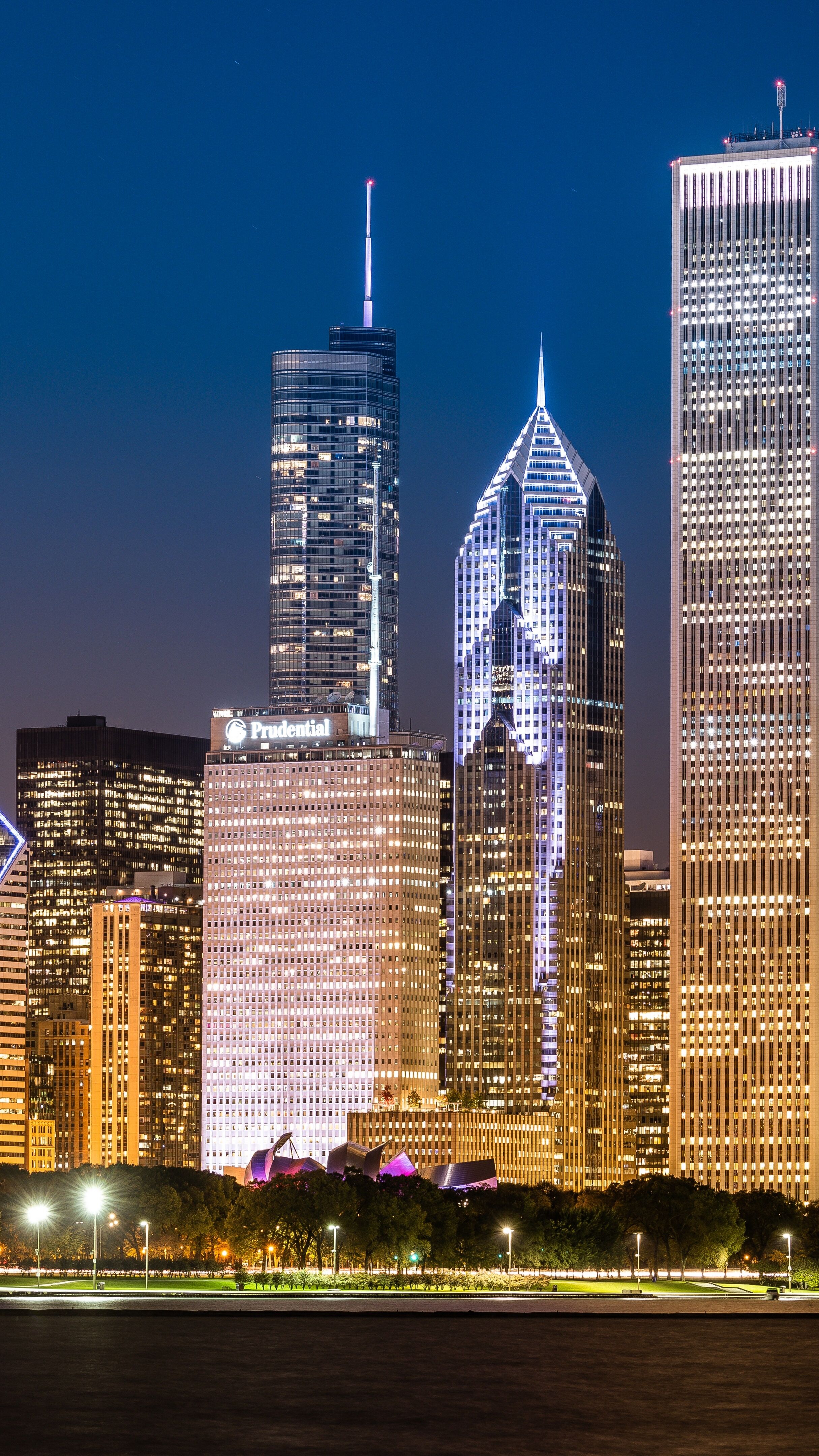 Chicago Night Skyline Glowing Over Lake Michigan - backiee