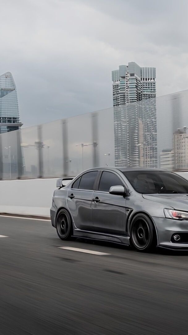 Mitsubishi Lancer Evo on Urban Highway - backiee