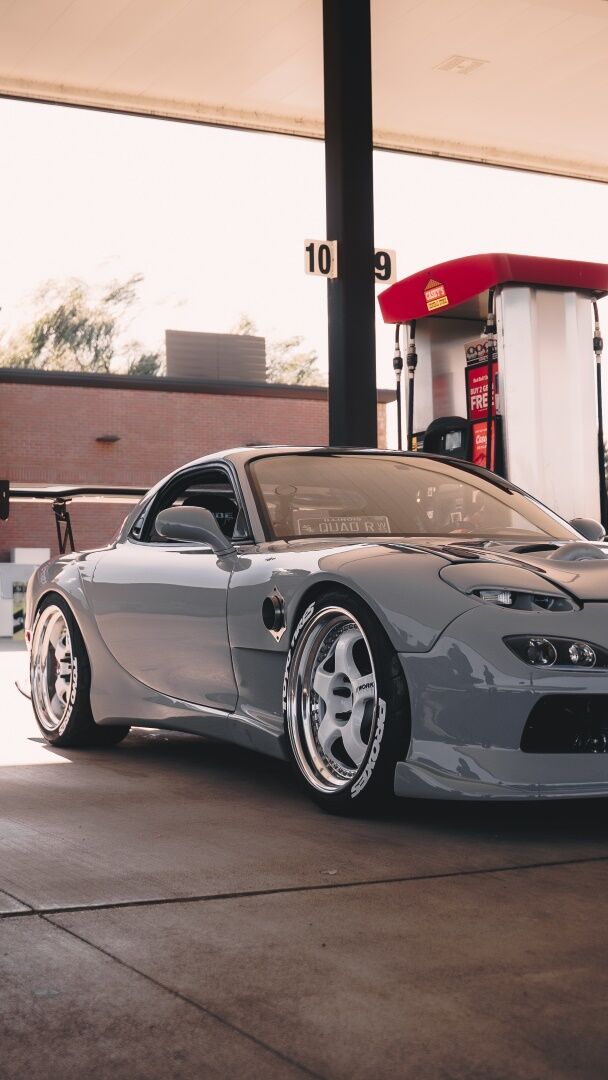 Mazda RX-7 Street Legend at a Quiet Gas Station - backiee