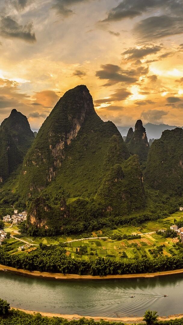 Sunset Over Guilin Karst Peaks and Winding River Landscape - backiee